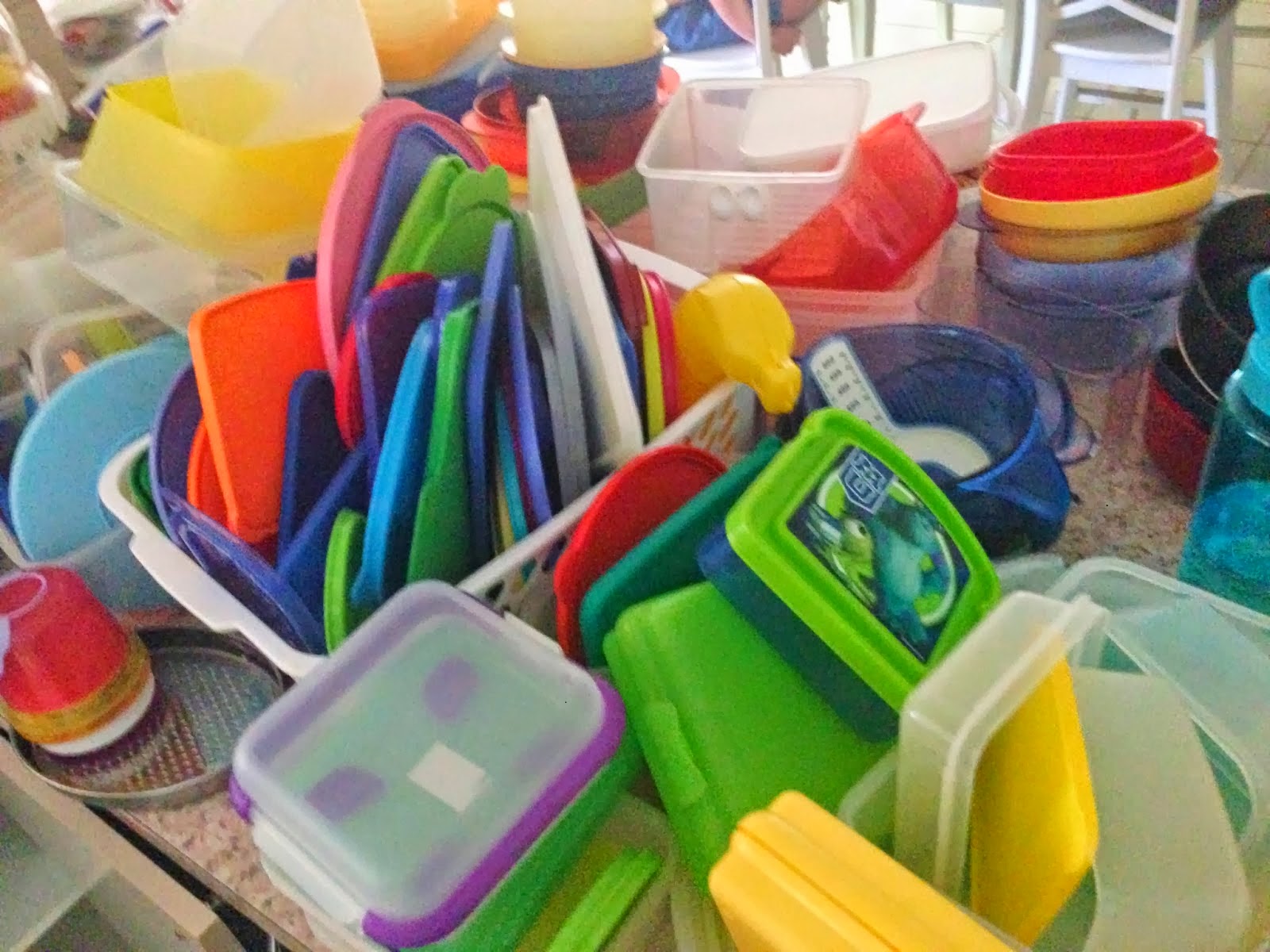 From the birds and the bees, to family trees.: My tupperware cupboard ...
